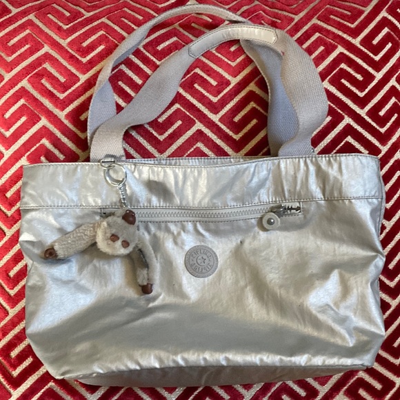 Kipling | Bags | Kipling Silver Logo Bag Neverused | Poshmark